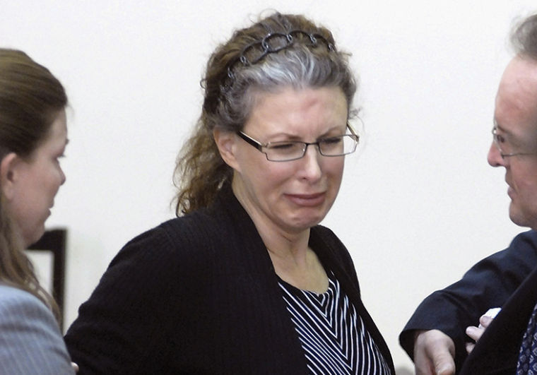 Police search home of inmate's mother