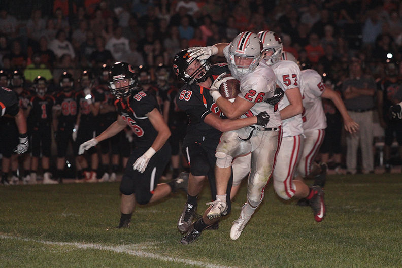 Improved Harlan tops Carroll