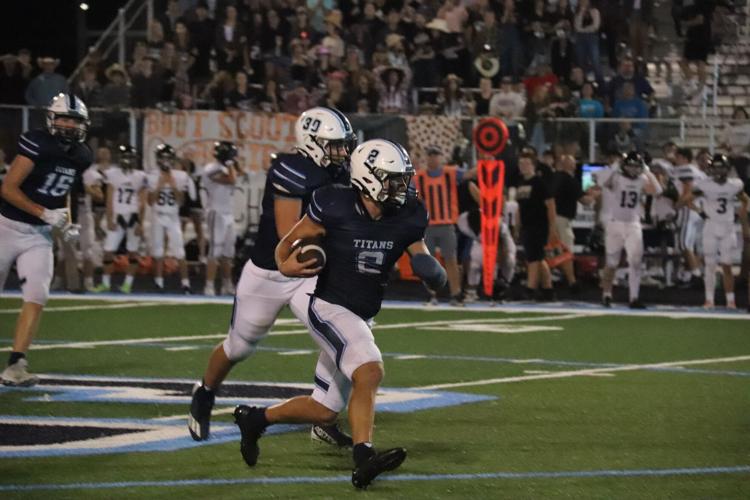 Titans top Rams in key district opener