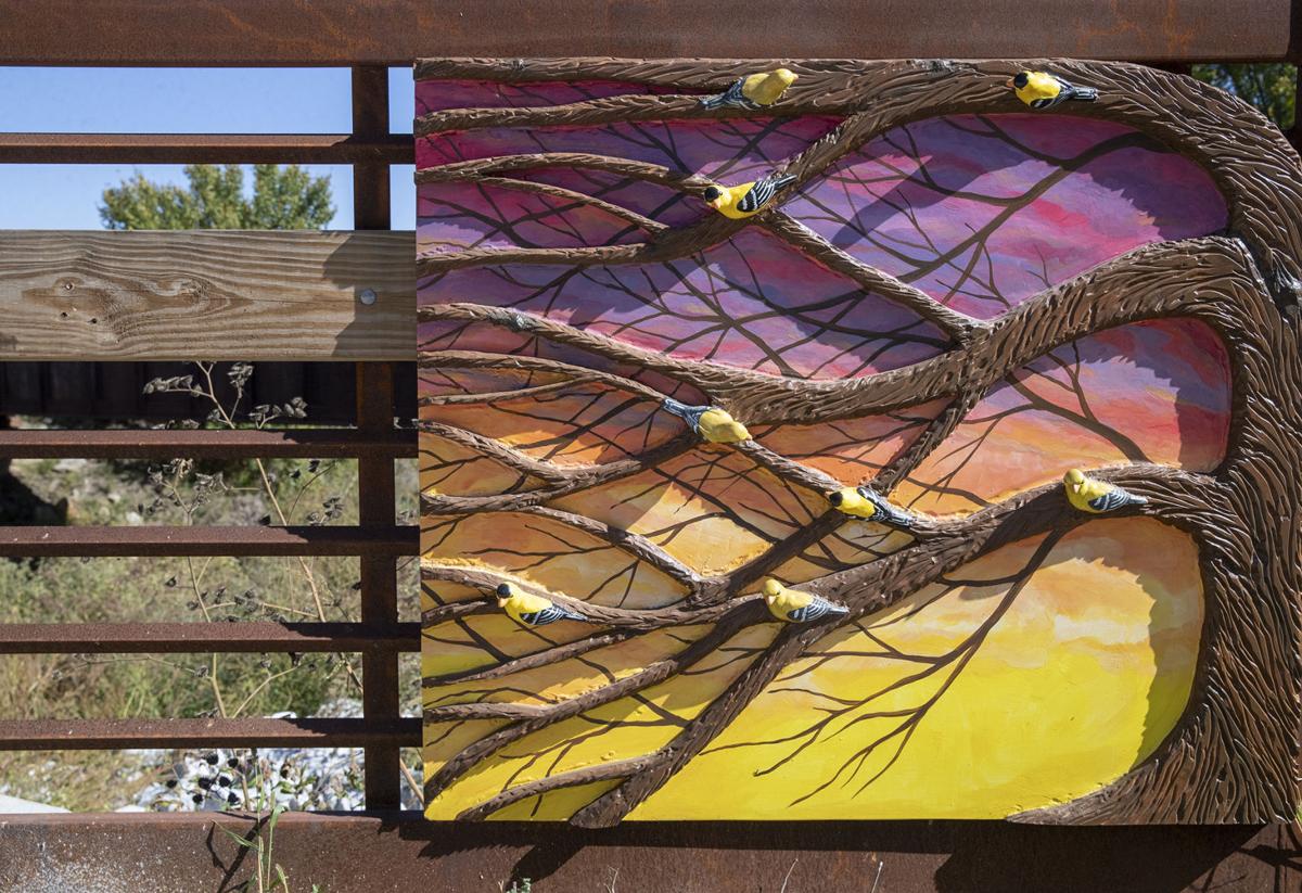 'Goldfinch Gates' bridge displays work of local artist Cait Irwin ...
