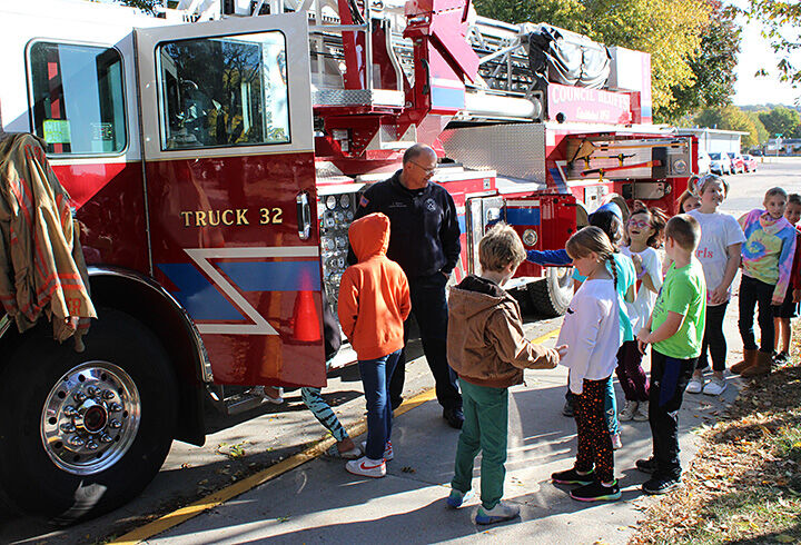 Council Bluffs firefighters visit schools to teach students all about ...