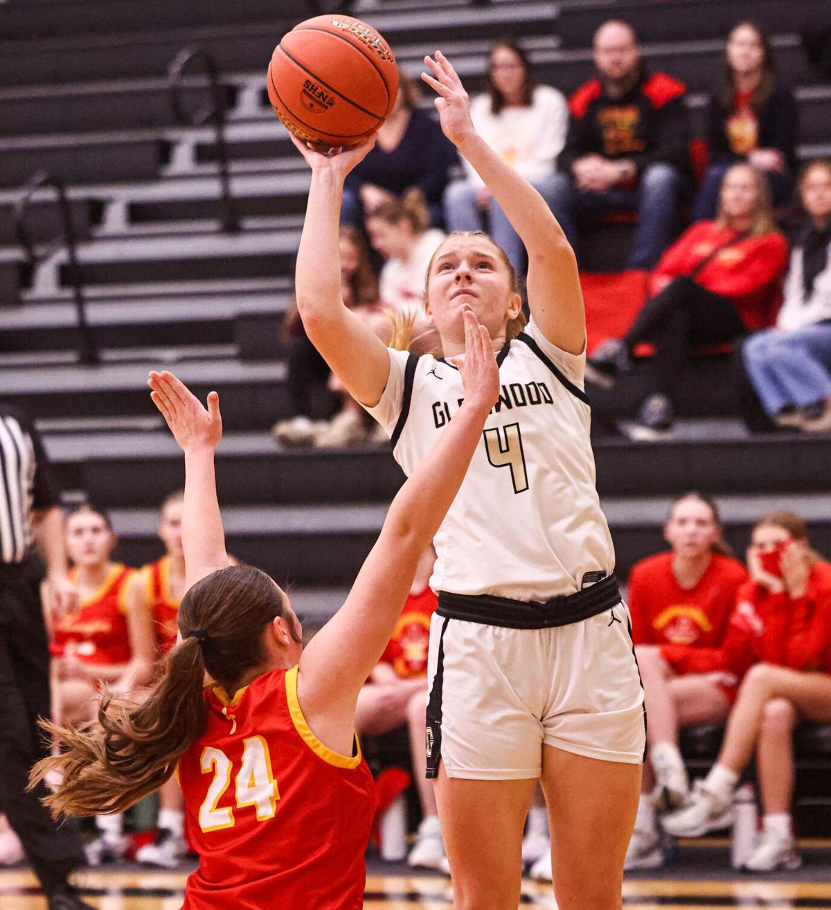 Kuemper Catholic girls march past Glenwood