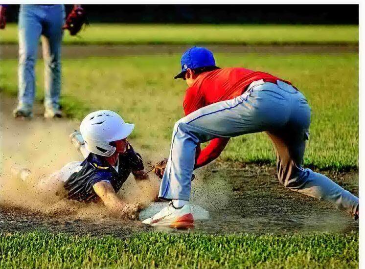 AHSTW's Nick Denning, right, tries to tag Riverside's