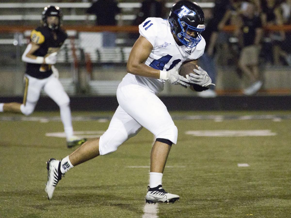 FOOTBALL: Titans pull away at Fremont before Friday's match-up with ...