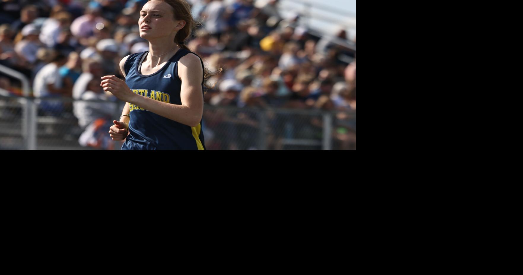 Heartland Christian cross country alum wins conference title