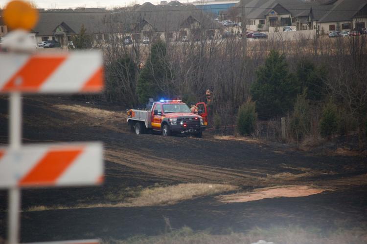 Fire department extinguishes grass fire, burn ban issued for county ...