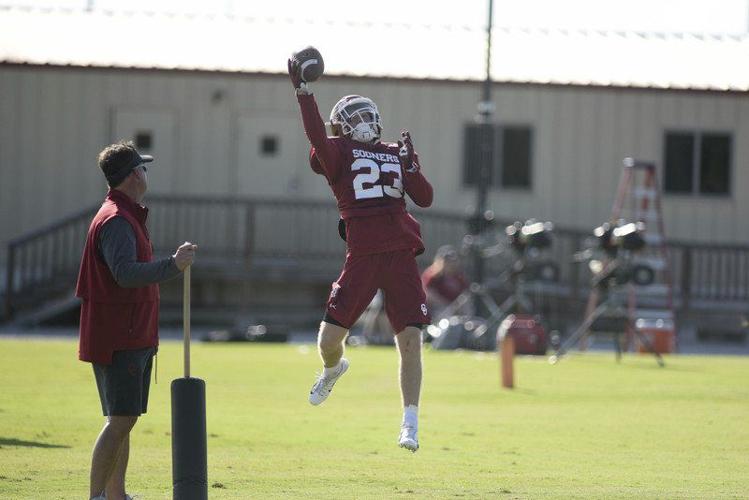 High school football: Isaac Stoops fills football void by following in ...