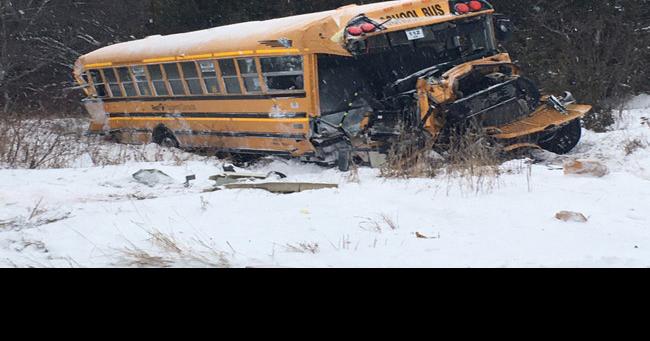 No injuries as school bus stuck on tracks hit by train