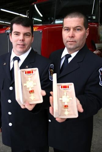Firefighters, police get bravery medals