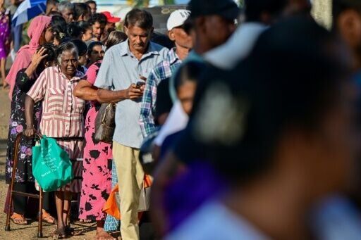 Anguished Sri Lankans queue for care after deadly cyclone | News ...