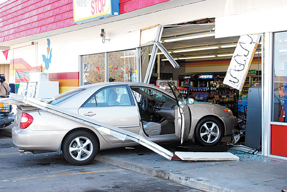 Car hits store; no one injured