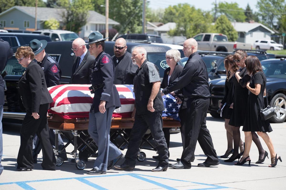 Law enforcement officers and the public honor Trooper Jerry Smith at ...