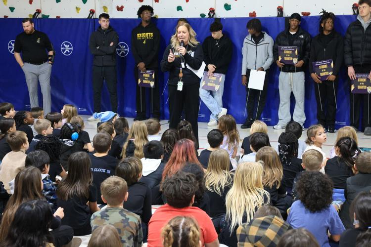 NPCC men's basketball players help Jefferson Elementary celebrate quarter
