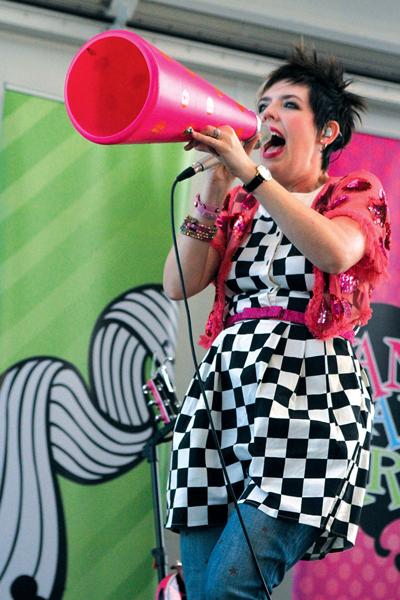 Former Husker coach, singer express their passions at family night