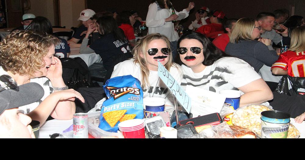 Teams tally up the score to raise funds during Trivia Night