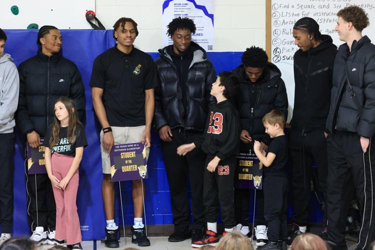 NPCC men's basketball players help Jefferson Elementary celebrate quarter