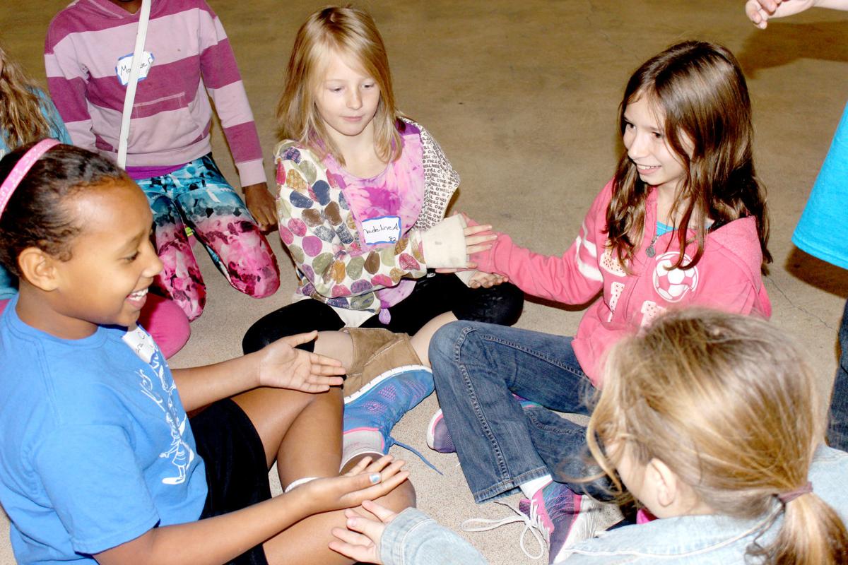 Mega fun: Students give thanks and a helping hand at Kids Klub event