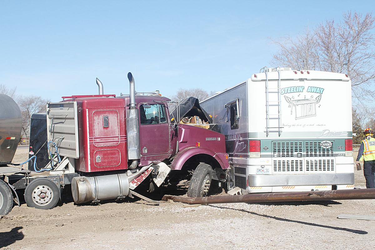 Two hospitalized after semi truck runs over car