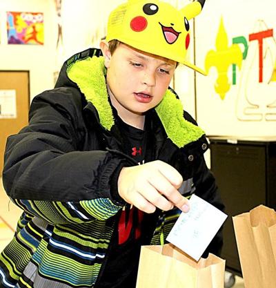 Kids put on their thinking caps for fun Math Night