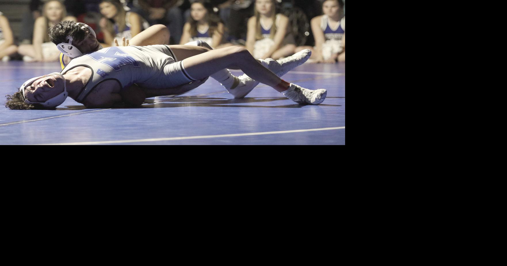 Darian Diaz earns win No. 100, but Bulldogs drop dual vs. Kearney 60-16