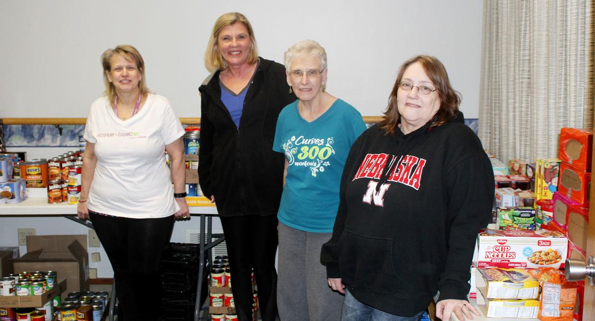 Curves donates 3,379 pounds to local food pantries
