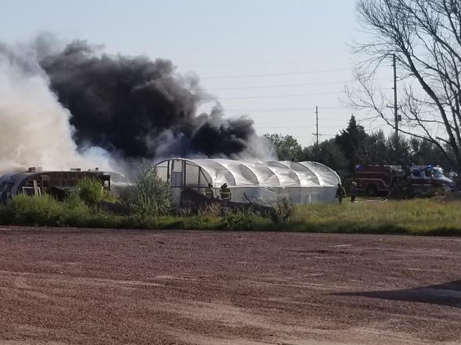 Fire destroys greenhouses