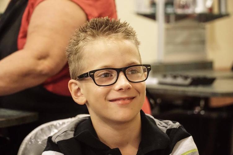 Mentor motivates two brothers to help children with cancer