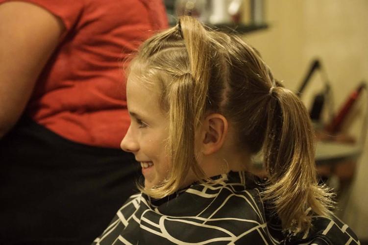 Mentor motivates two brothers to help children with cancer
