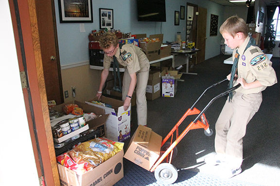 Scouts collect food for local pantries