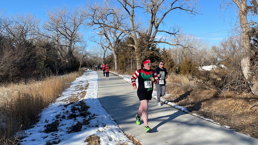 Jingle Bell Run brings out 'reindeer,' bells and running shoes