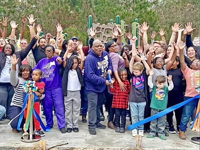 ‘It means the world’ – volunteers, trust funding make Bolton playground ...