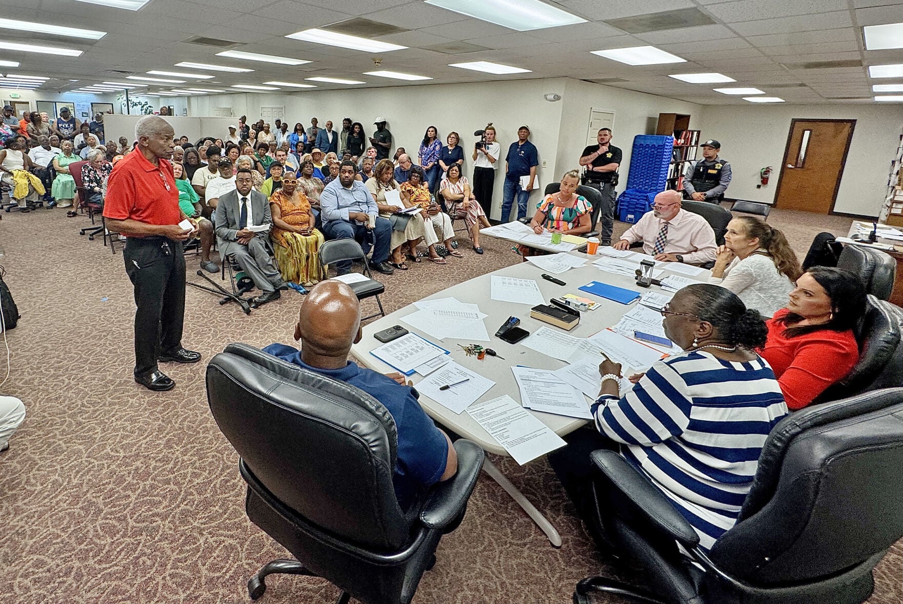 Crowd urges elections board to keep all five early voting sites | News ...