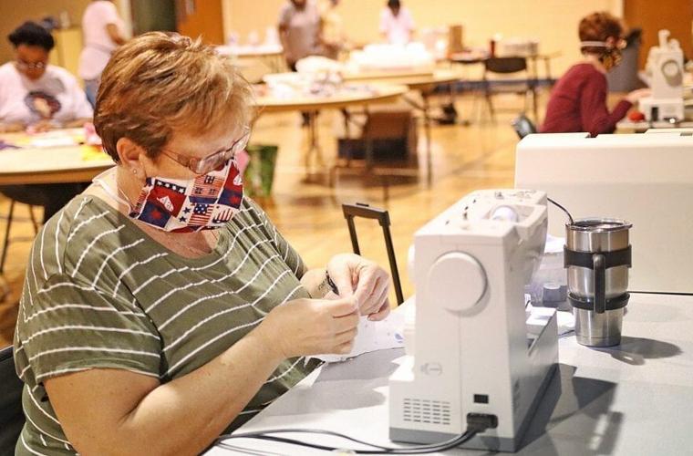 Volunteers make face masks in assembly line | Coronavirus | nrcolumbus.com