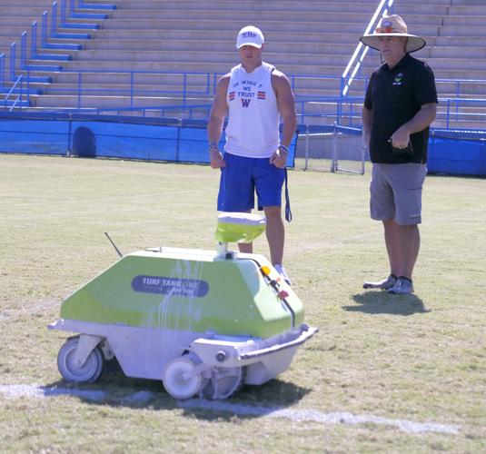Robot paints Whiteville football field prior to Pender game | Sports ...