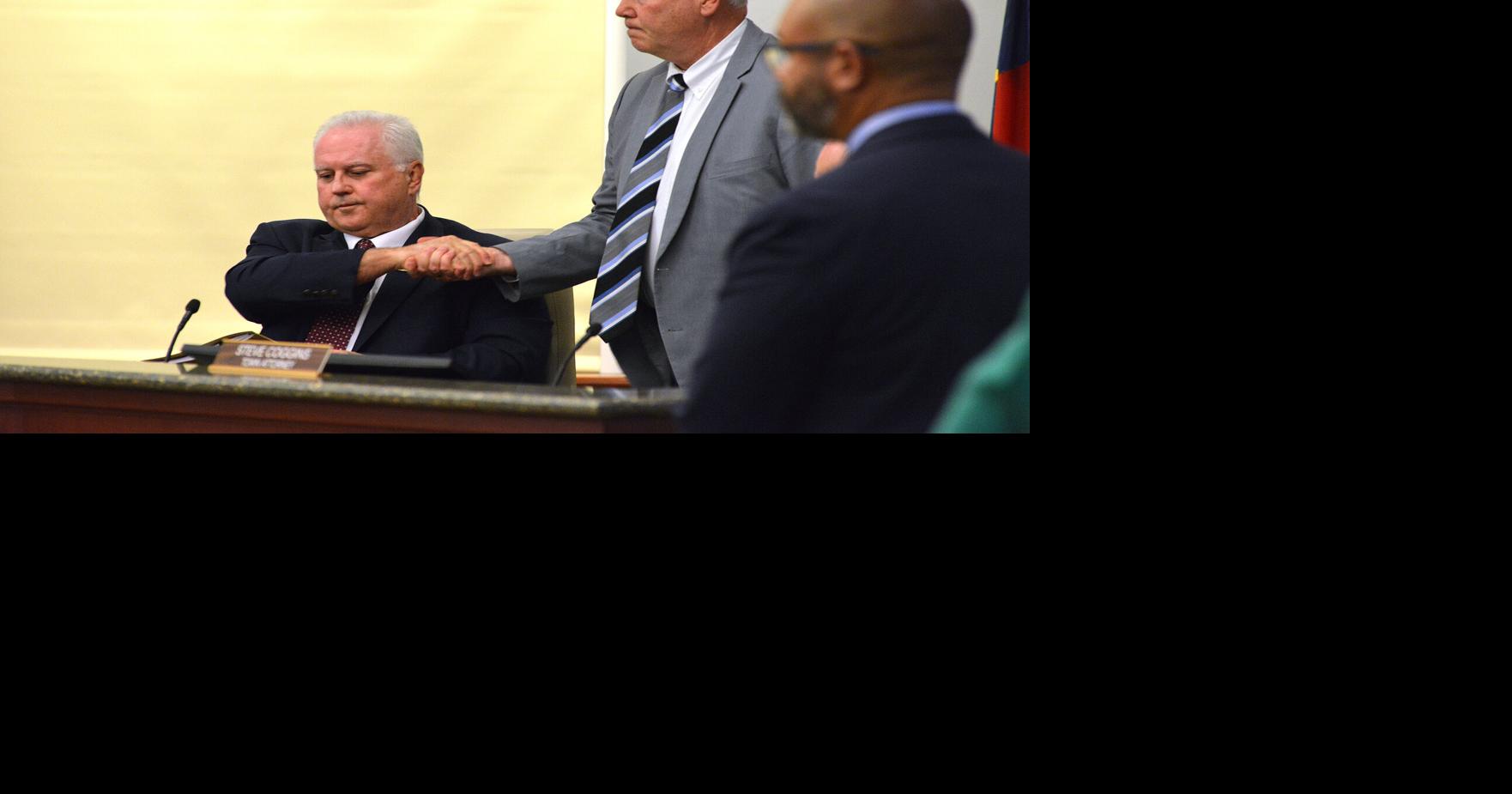 Leland councilman, manager: Resolution reached in laptop dispute ...