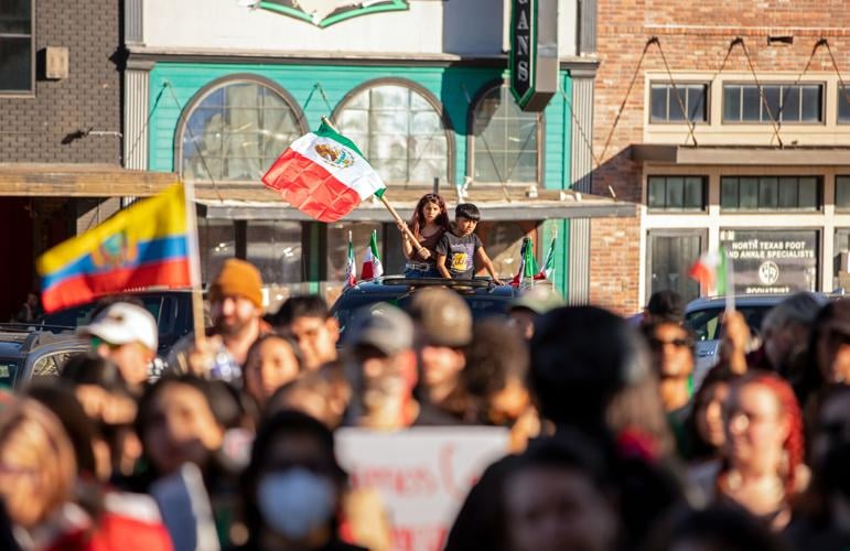 Mass deportation protest attracts hundreds in response to recent ICE ...