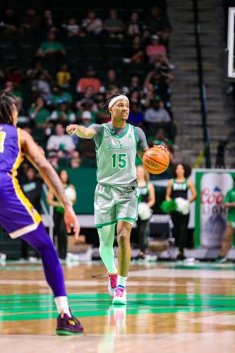 GALLERY: Rubin Jones, 'voice' of the men's basketball team, displays ...