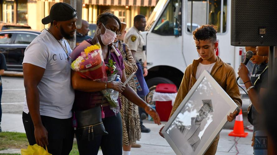 Hundreds attend Tuesday night vigil commiserating victims of police ...