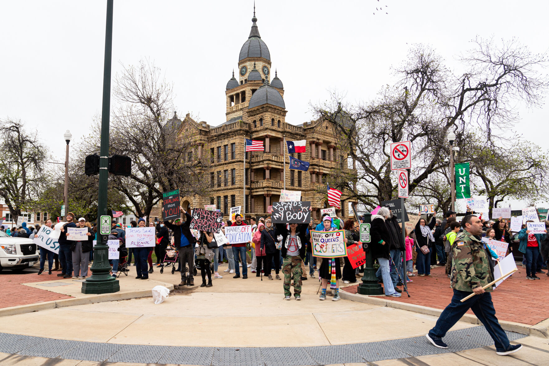 Attendees ‘tired of the bulls—t’ gather at Denton’s Hands Off! protest ...