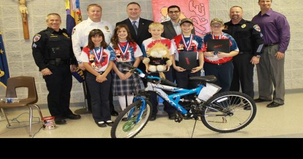 Sgt. Benson, CPPD graduate 55 St. Mary 5th grade DARE students