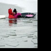 Girl falls through ice at fairgrounds