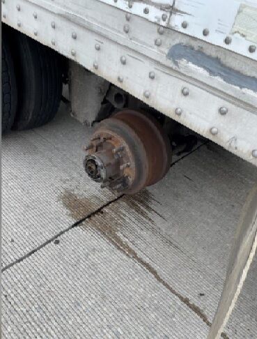 Wheel detaches from semi, strikes teen changing tire