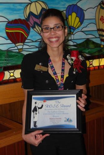 Maria Davila receives ROSE award