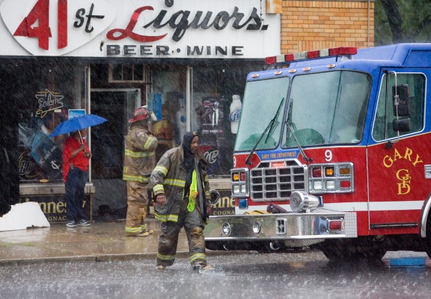 Gary firefighter struck by car while responding to fire