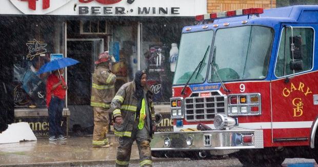 Gary firefighter struck by car while responding to fire