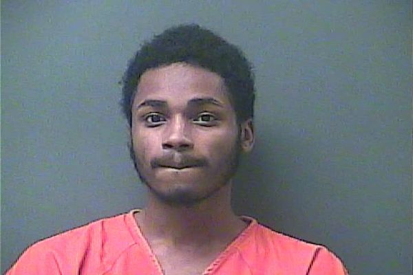 Man pointed gun at woman after arriving with their child, police say