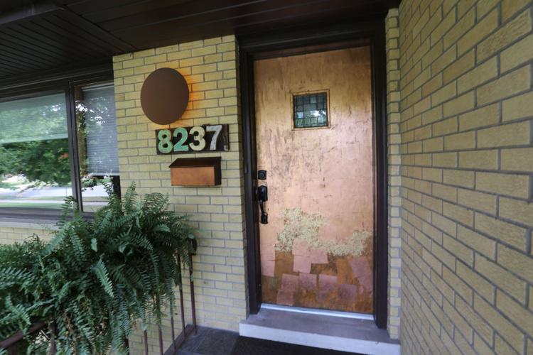 Two artists create one-of-a-kind artwork in Munster house