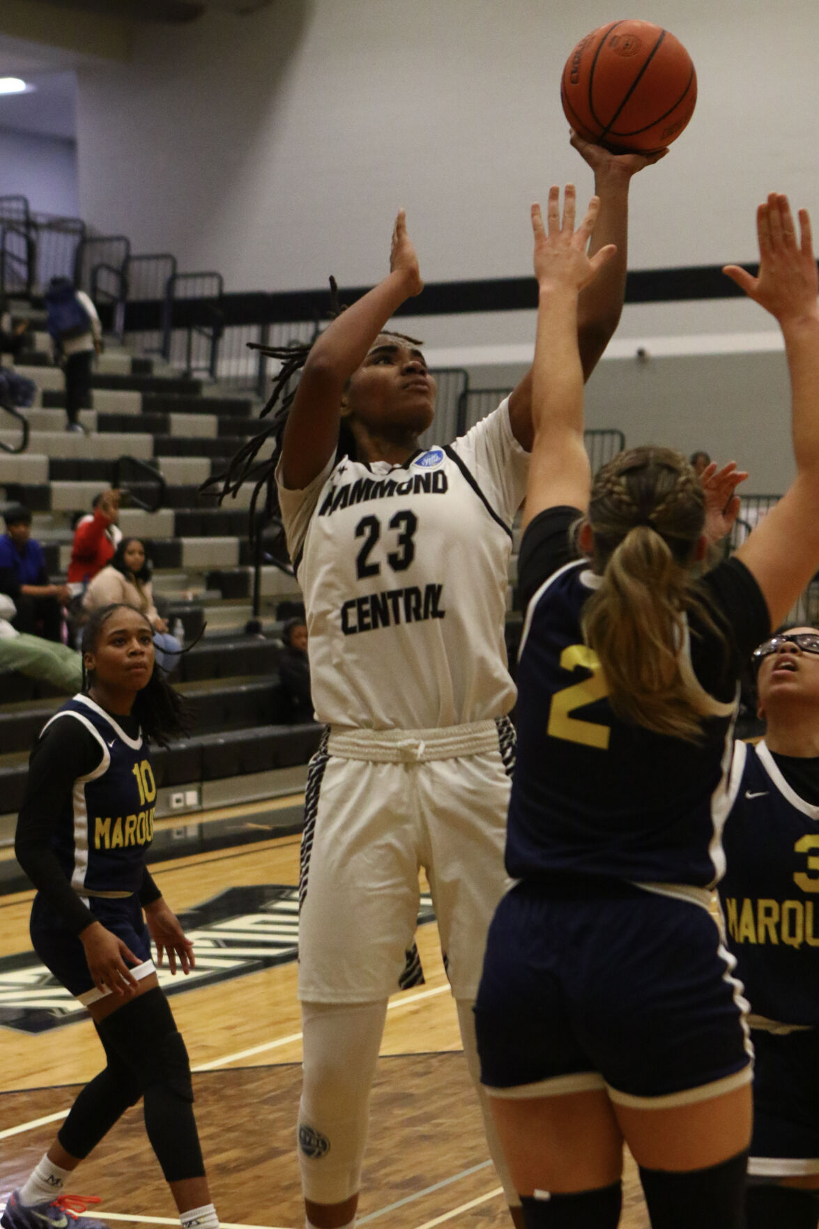 PHOTOS: Marquette Catholic visits Hammond Central in girls basketball