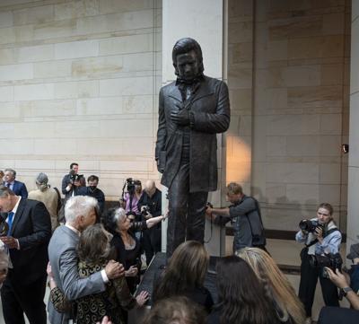 Hello, I'm Johnny Cash's statue: A monument to the singer is unveiled ...