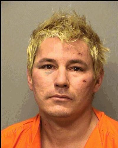 Man faces felonies after allegedly spitting on Portage police officer ...